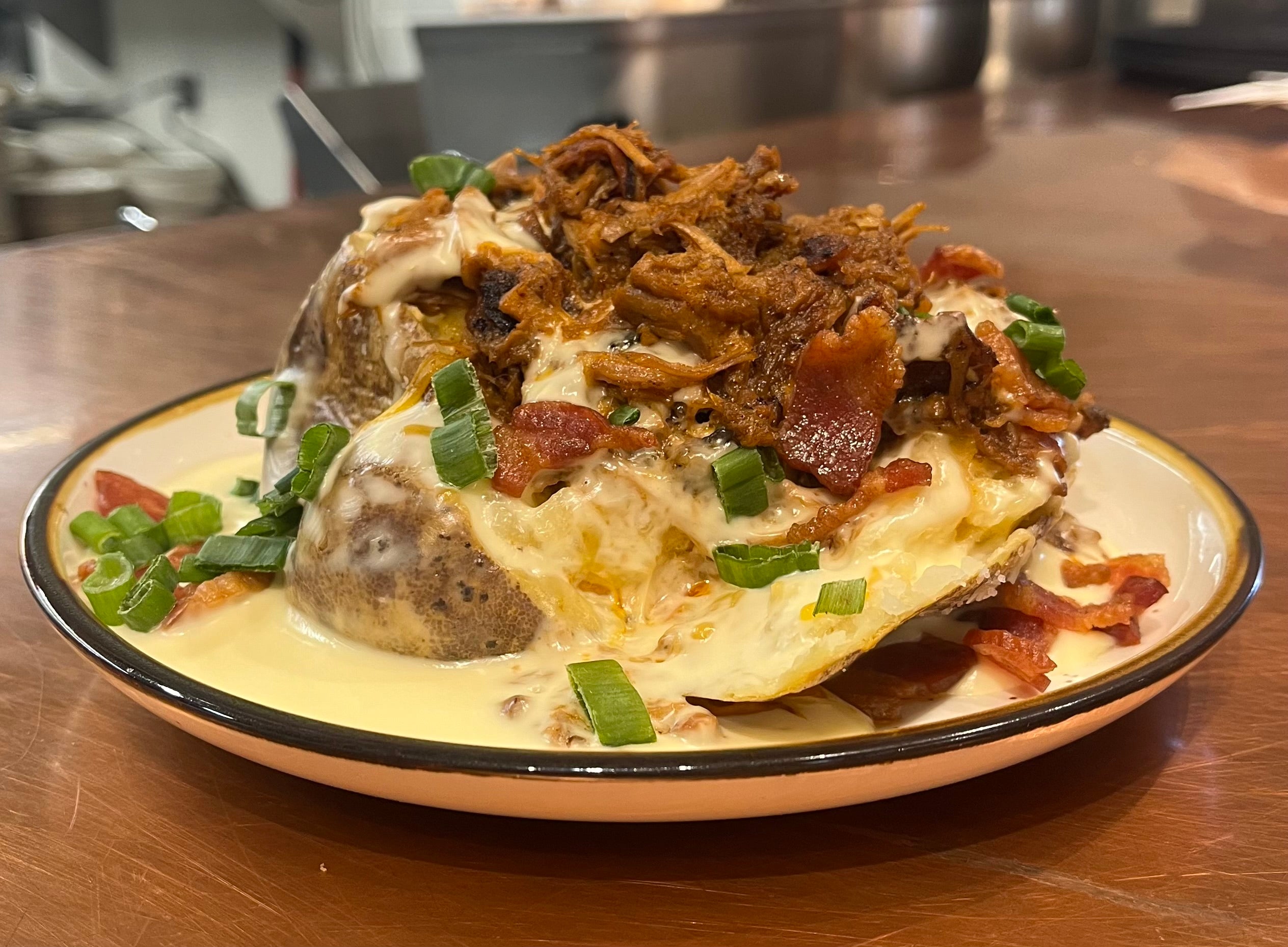 Loaded Pulled Pork Spud (1) | Oink Inc Smokehouse